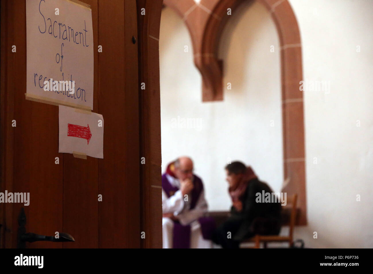 Leonhardskirche. European Youth meeting of Taize in Basel. Sacrament of ...