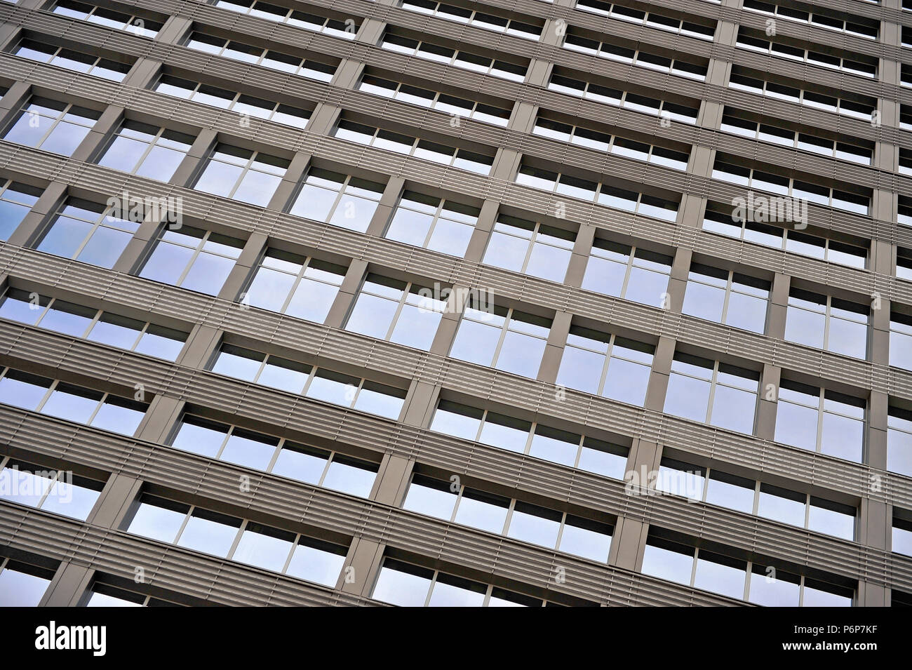 Grey steel office building exterior Stock Photo - Alamy