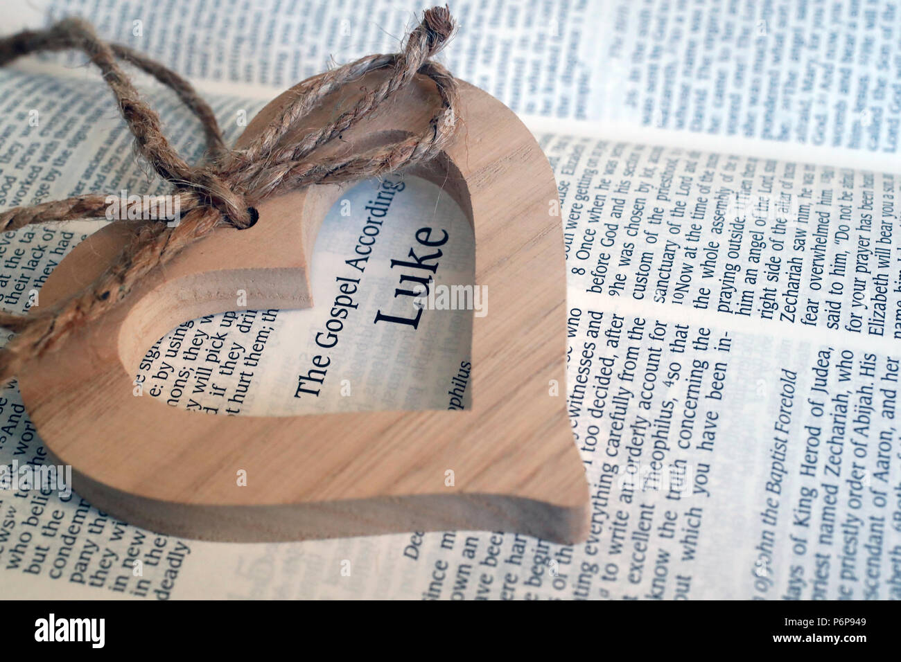 Bible with heart. The gospel of Luke. Close-up. France Stock Photo - Alamy