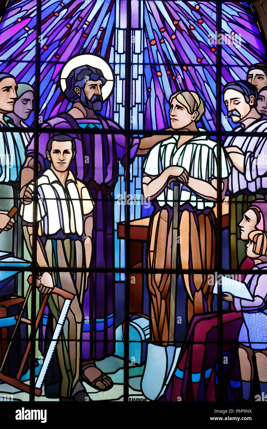 Saint-Joseph church. Saint Joseph with young workers. Stained glass ...