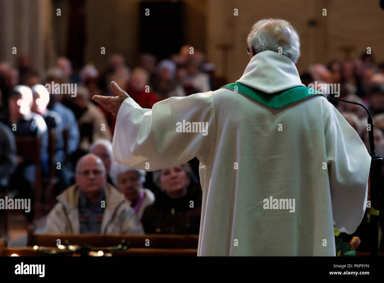 Saint-Jacques church. Catholic mass. Liturgy of the Word. Homily ...