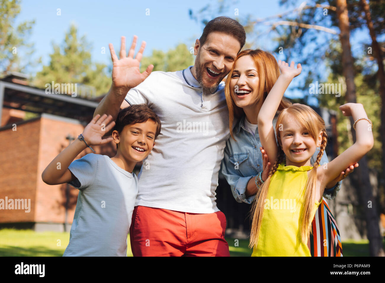 Joyful family spending time together Stock Photo - Alamy