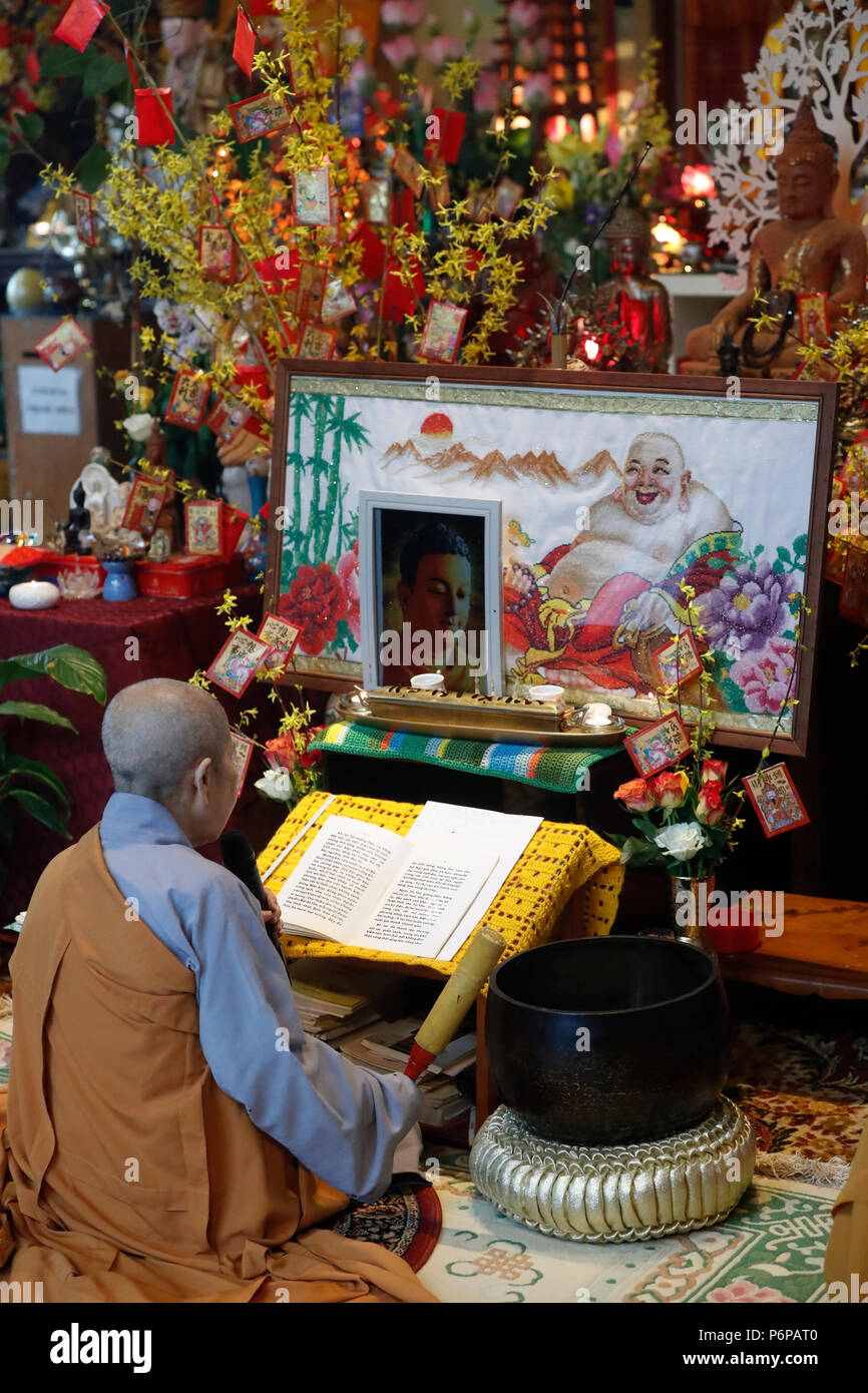 Chua Tu An Buddhist temple. Monk at buddhist ceremony. SInging bowl ...