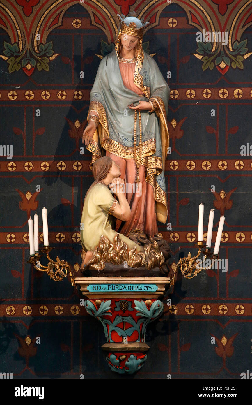 Notre Dame de Clermont cathedral, Clermont-Ferrand, France. Statue of ...