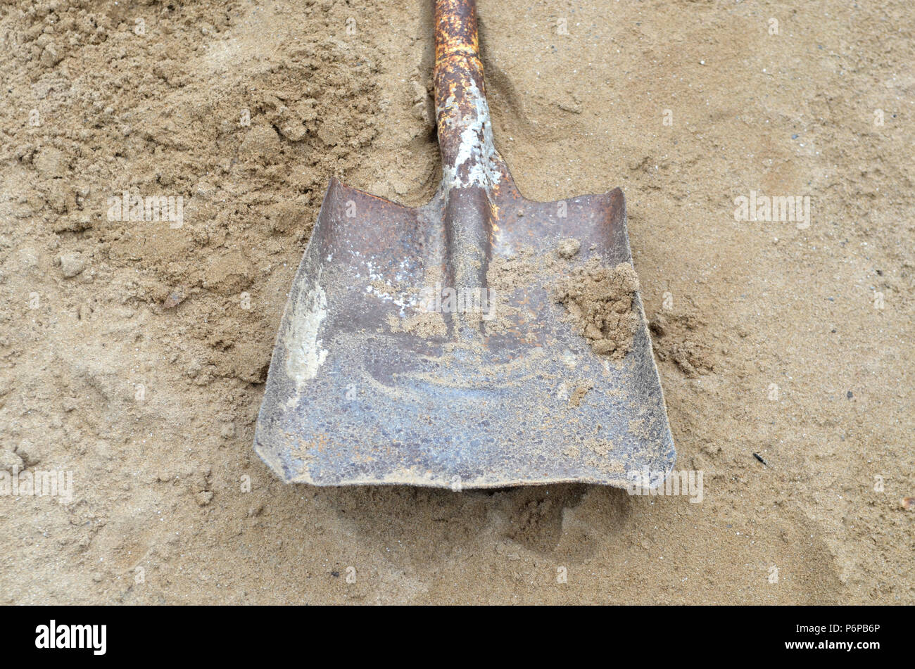 Soil with shovel. Close-up Stock Photo - Alamy