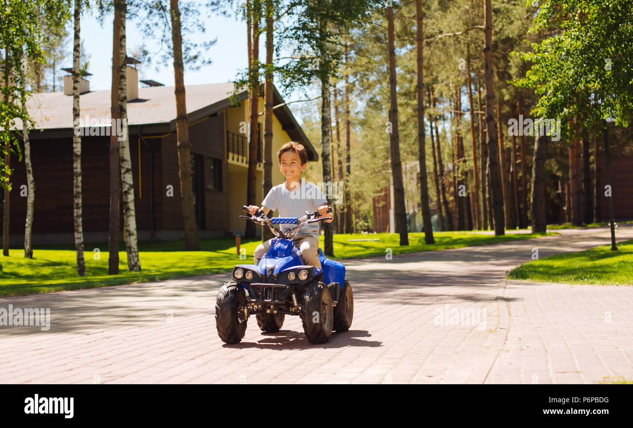 Child driving atv hi-res stock photography and images - Alamy