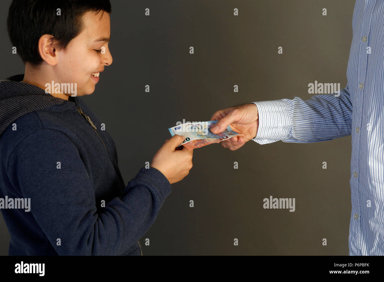 Man receiving money hi-res stock photography and images - Alamy