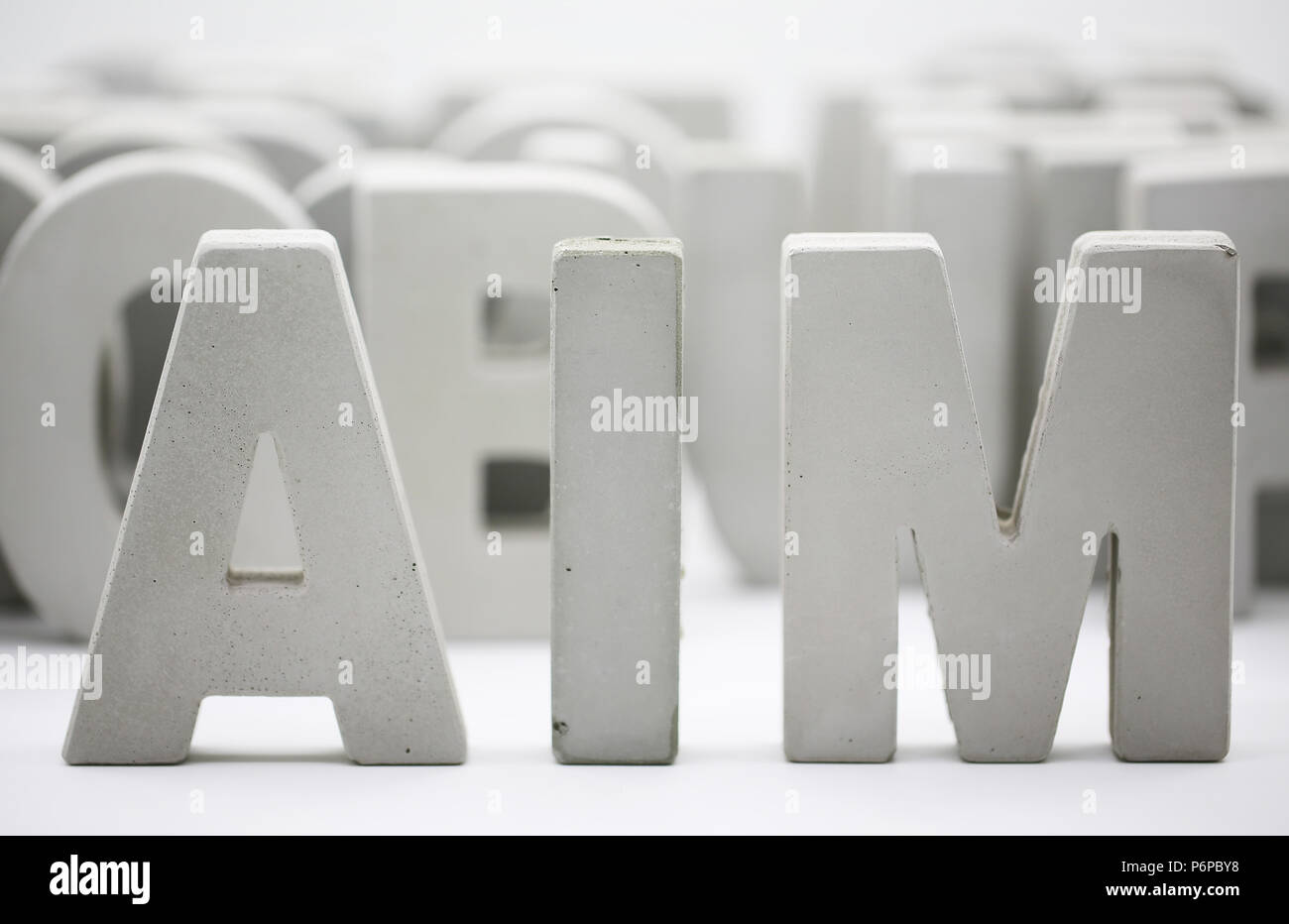 block of word Aim Stock Photo - Alamy