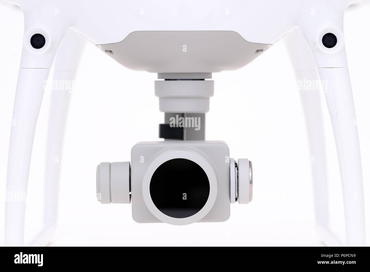 Close up of small camera on gimbal of drone on white background Stock ...