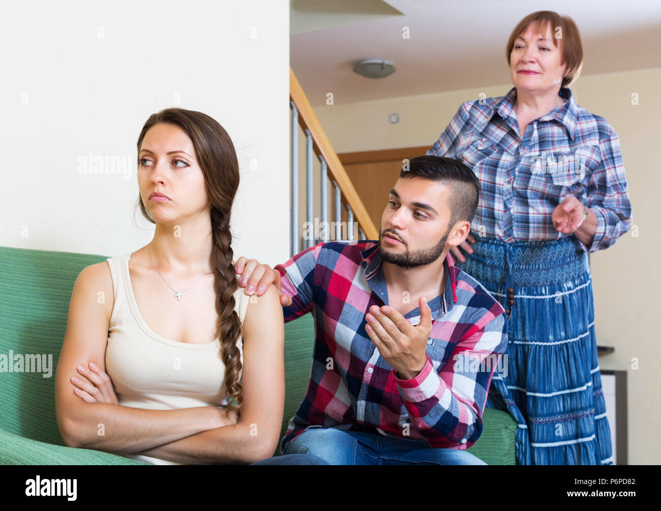 Elderly mother having conflict with their upset adult children Stock ...