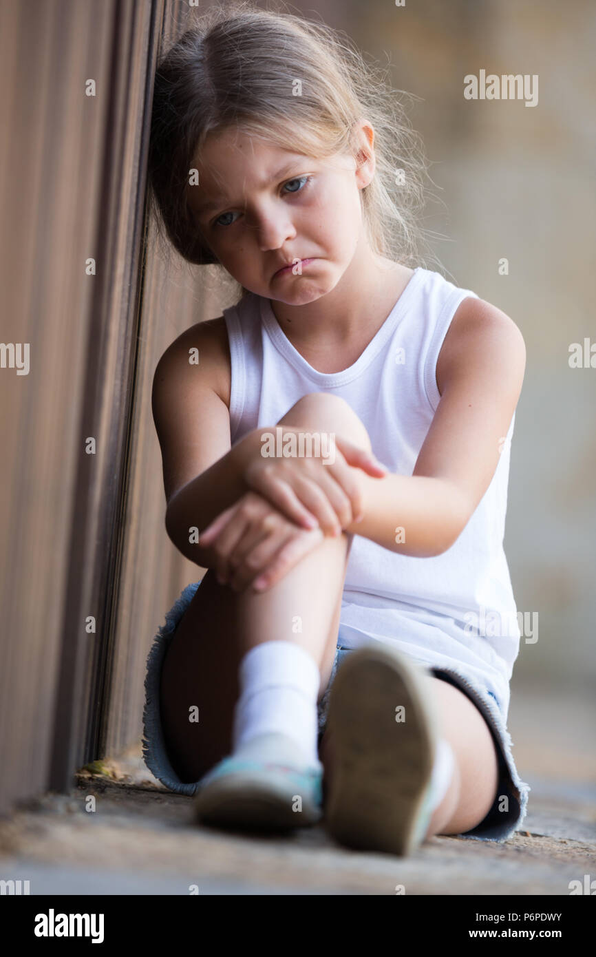 portrait of sad girl being alone and worried outdoors Stock Photo - Alamy