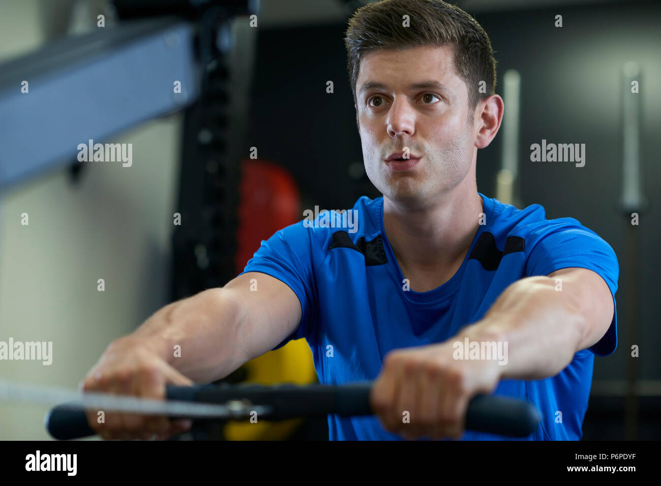Men on rowing machine hi-res stock photography and images - Alamy
