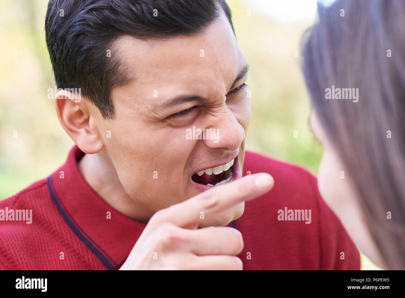 Outdoor Shot Of Young Couple Having Argument Stock Photo - Alamy