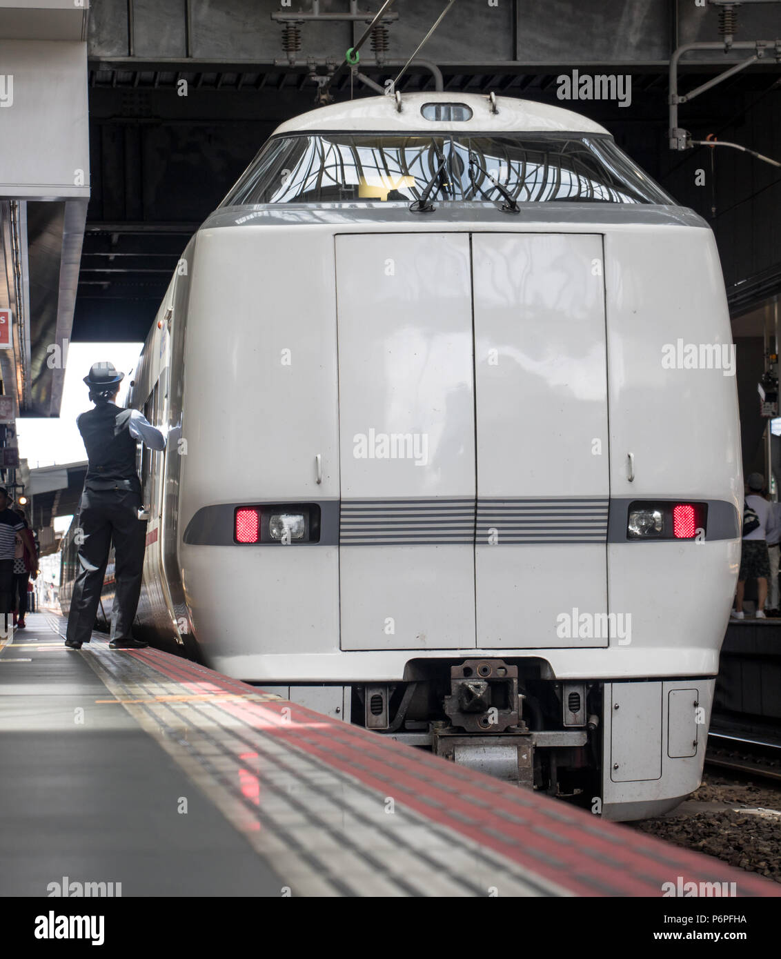 The locomotive of the train stands on the platform of the railway ...