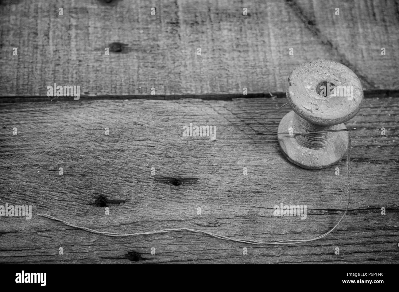 Wooden reel of thread hi-res stock photography and images - Alamy