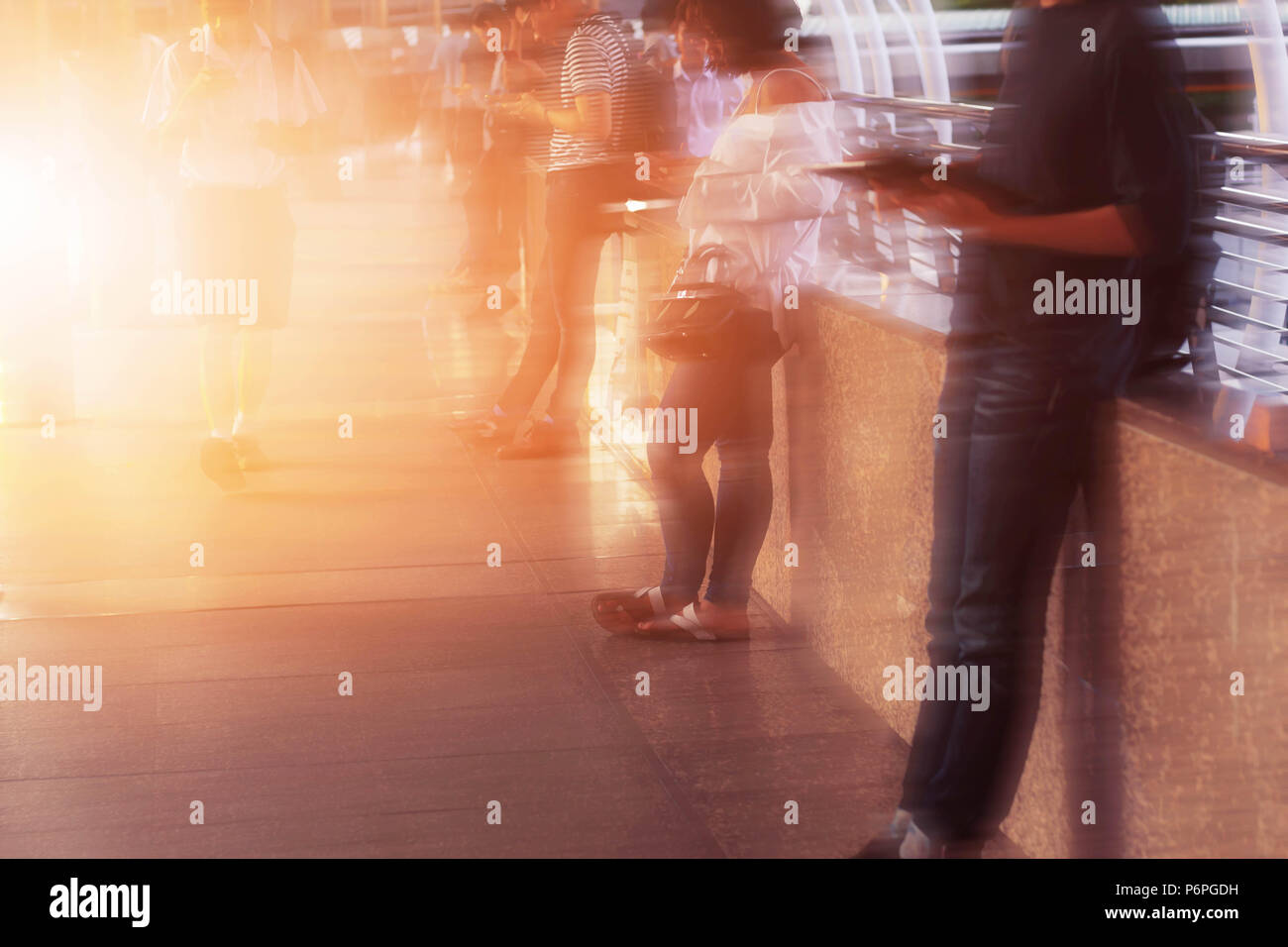 People are using cell phones in the city with blurred images Stock ...