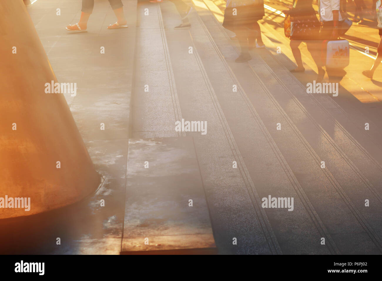 stairs and people are walking in the evening Stock Photo - Alamy