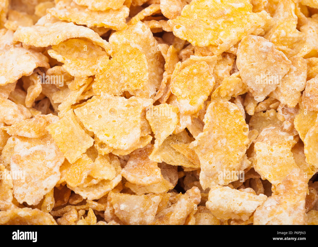 Organic fresh cereal granola corn flakes macro texture Stock Photo - Alamy