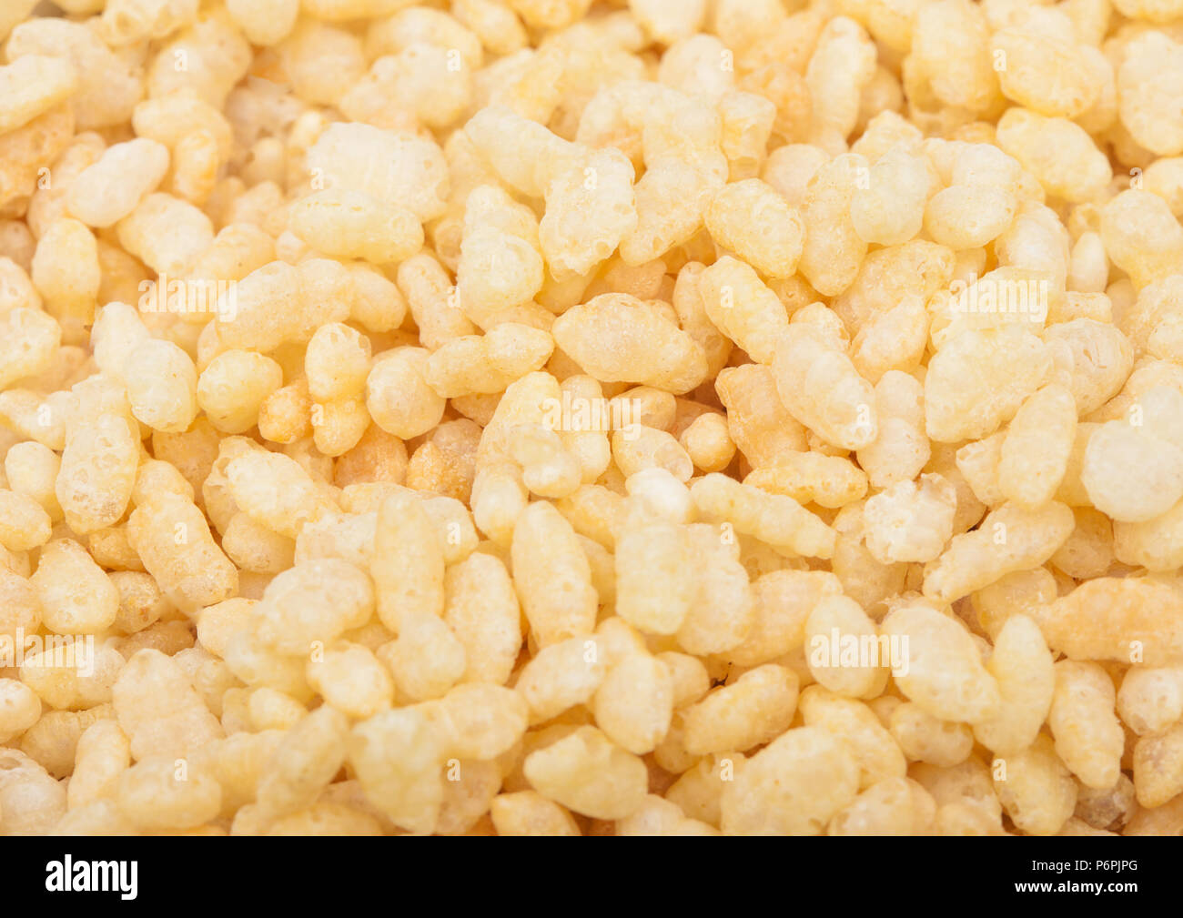 Organic fresh cereal granola rice flakes macro texture Stock Photo - Alamy