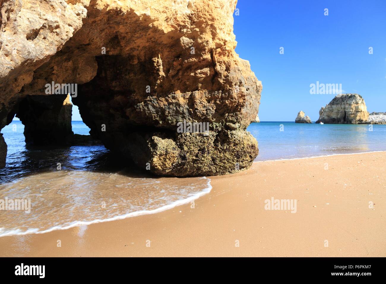 Portugal Atlantic coast landscape in Algarve region. Praia do Pinhao ...