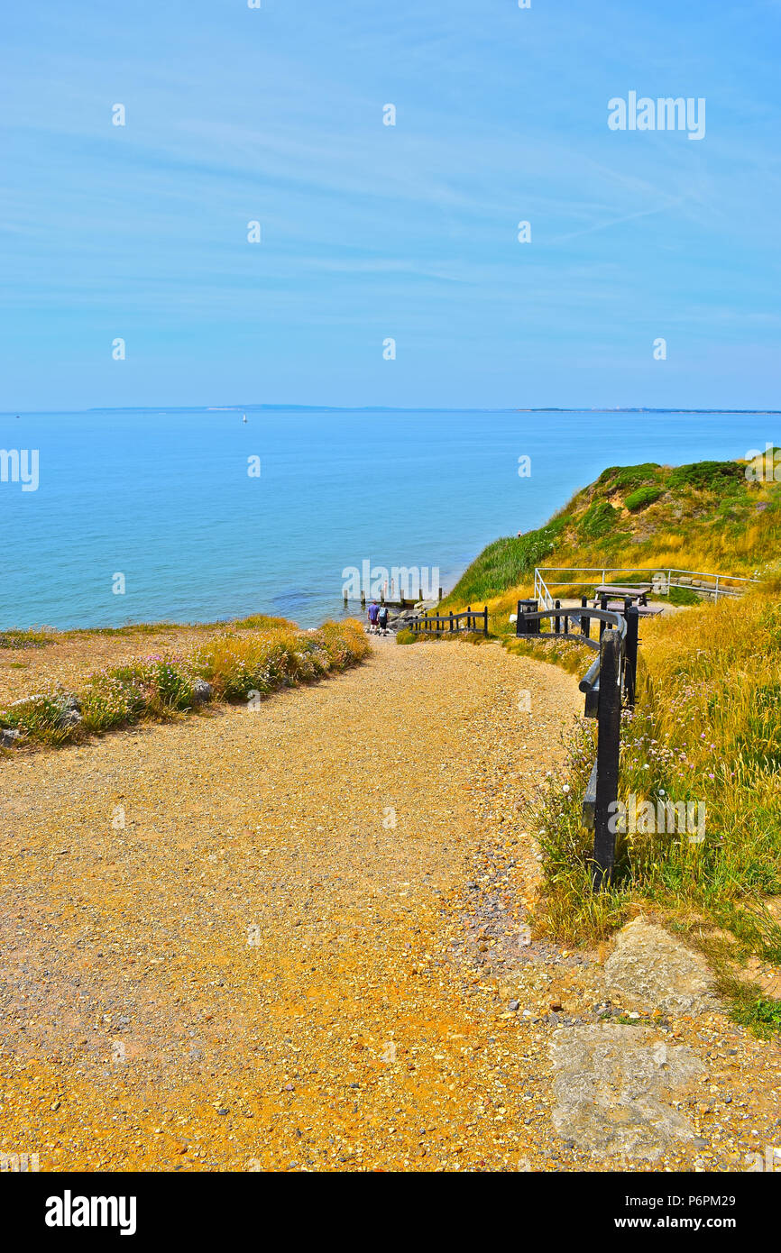 A sloping shingle path leads down to the pebbly beach at Milford on Sea ...