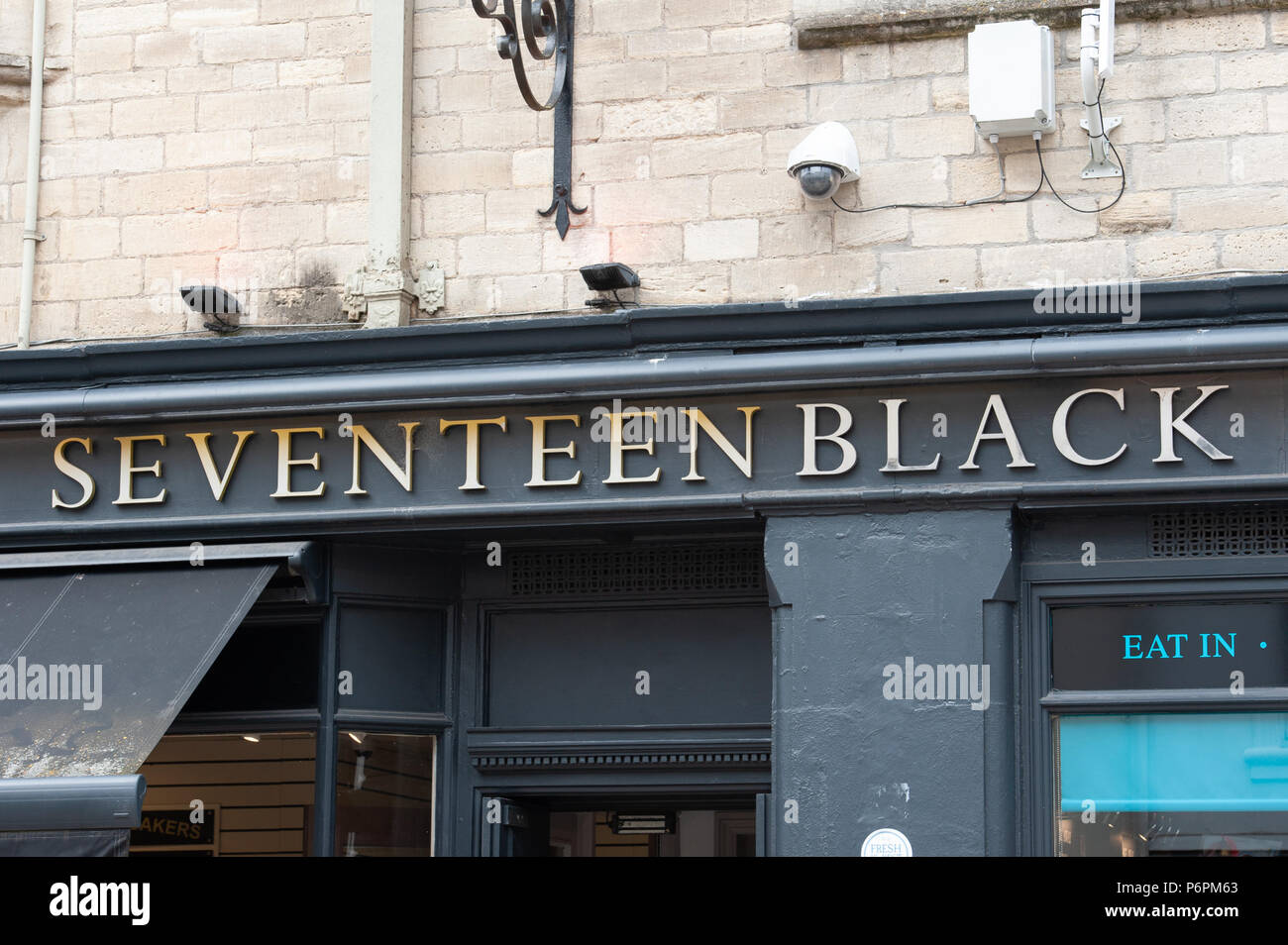 Shop name incorporating a number and a colour Stock Photo - Alamy