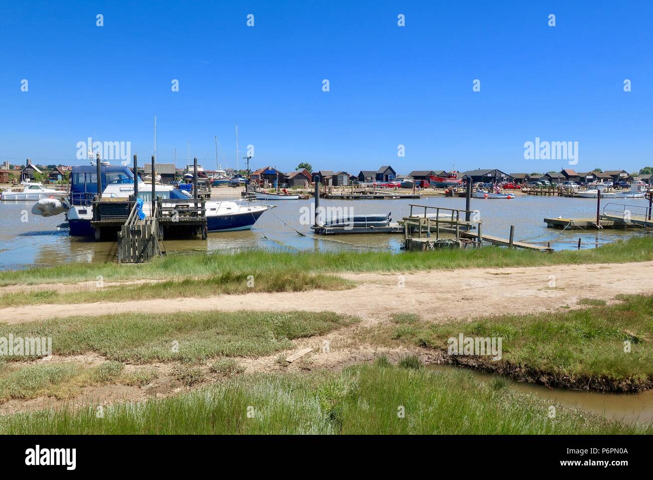 Boats moored on the River Blyth at Walberswick, Suffolk, UK. June 2018 ...