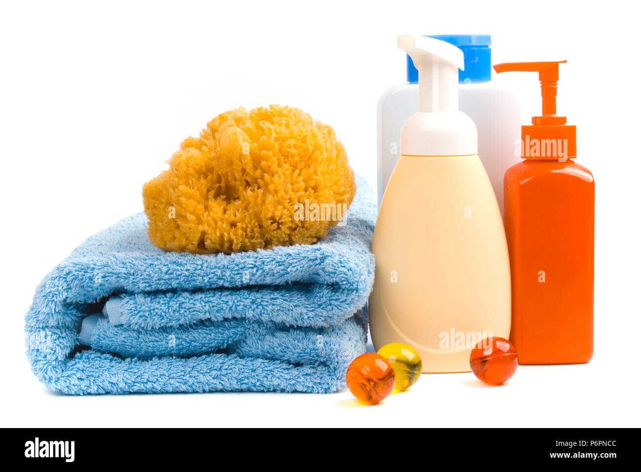 body care products and towel on white background Stock Photo - Alamy