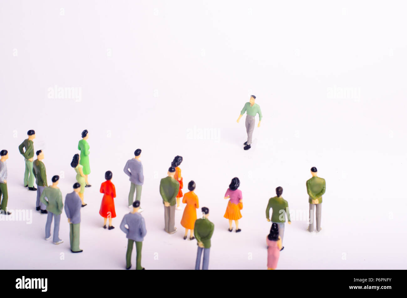 The crowd is looking at the man who comes towards her on a white ...