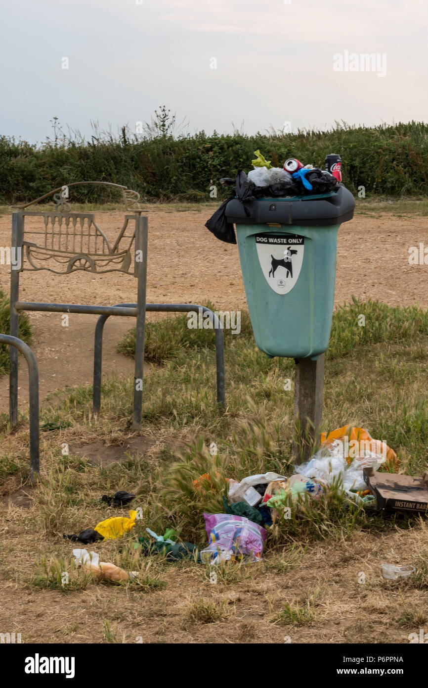 dog mess or dog poo droppings bin Stock Photo - Alamy