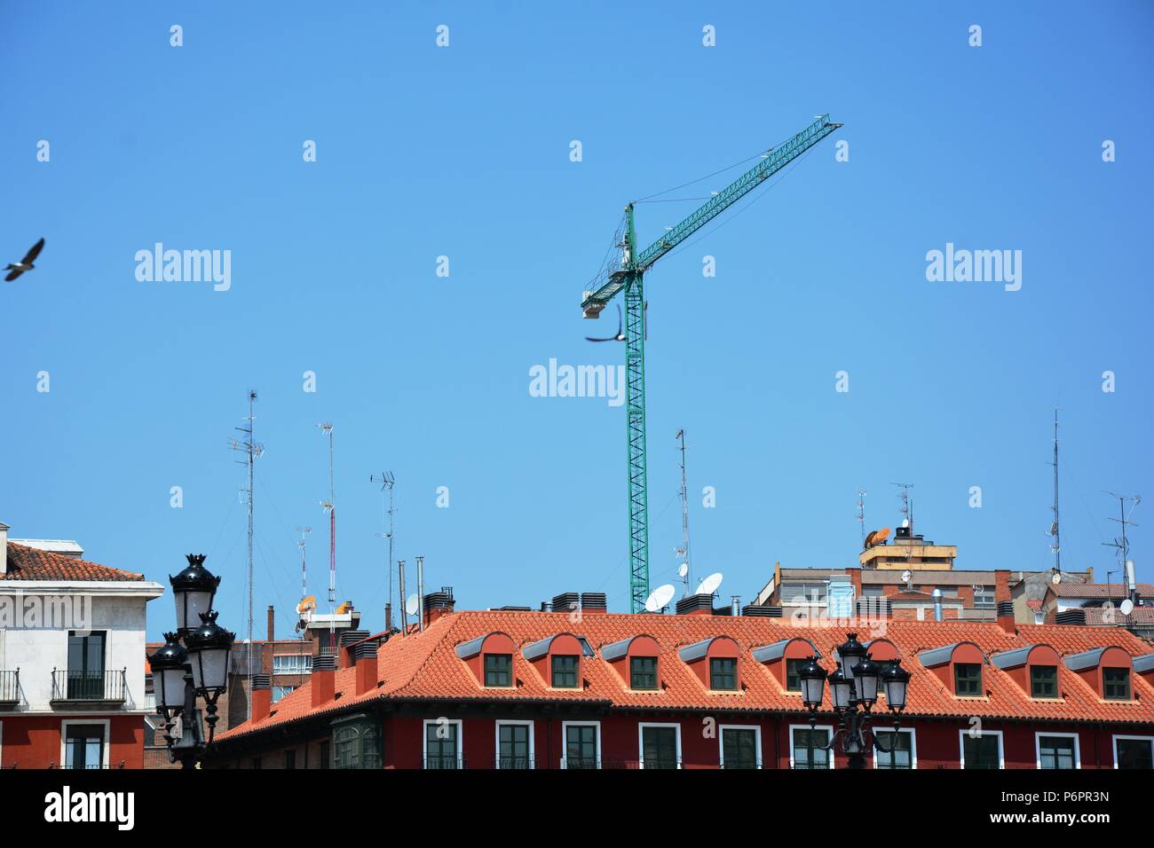 crane and buildings Stock Photo - Alamy