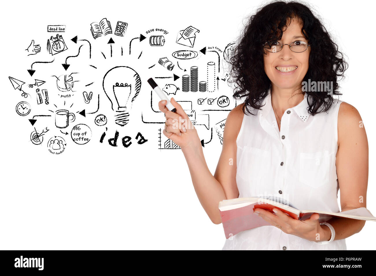 Portrait of beautiful school teacher holding books and pointing ...
