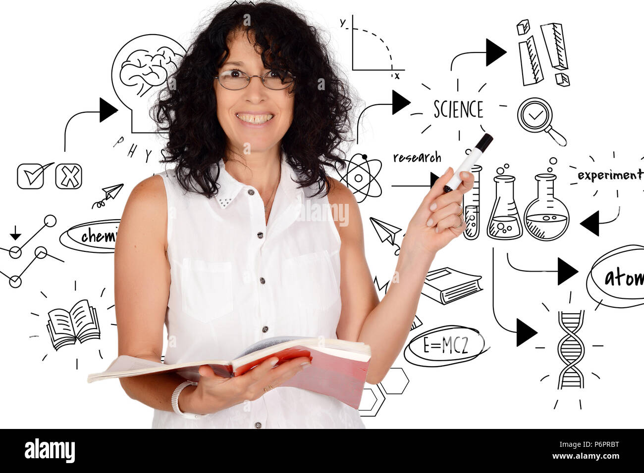 Portrait of beautiful school teacher holding books and pointing ...