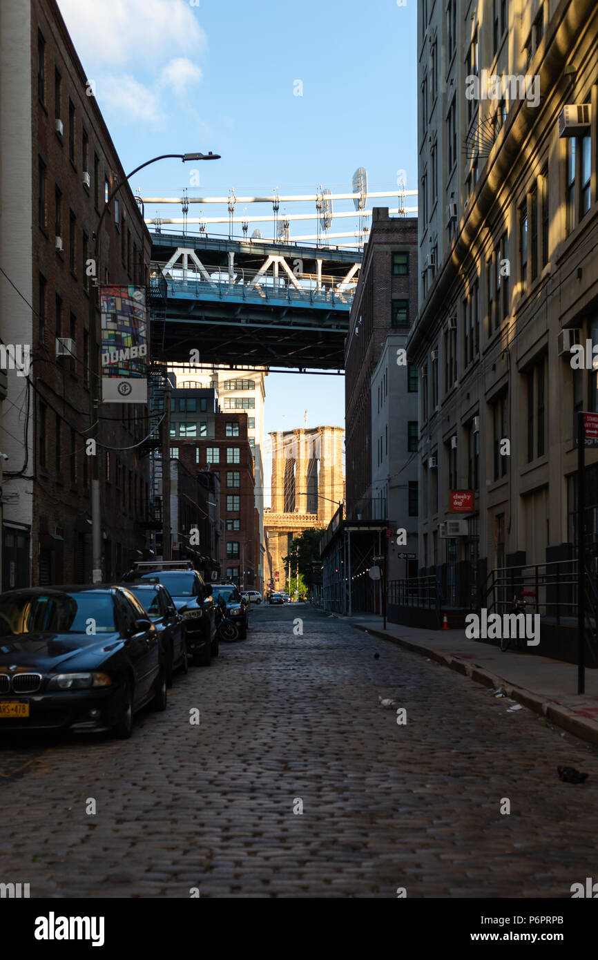 New York City / USA - JUN 25 2018: Quiet street with Brooklyn Bridge ...