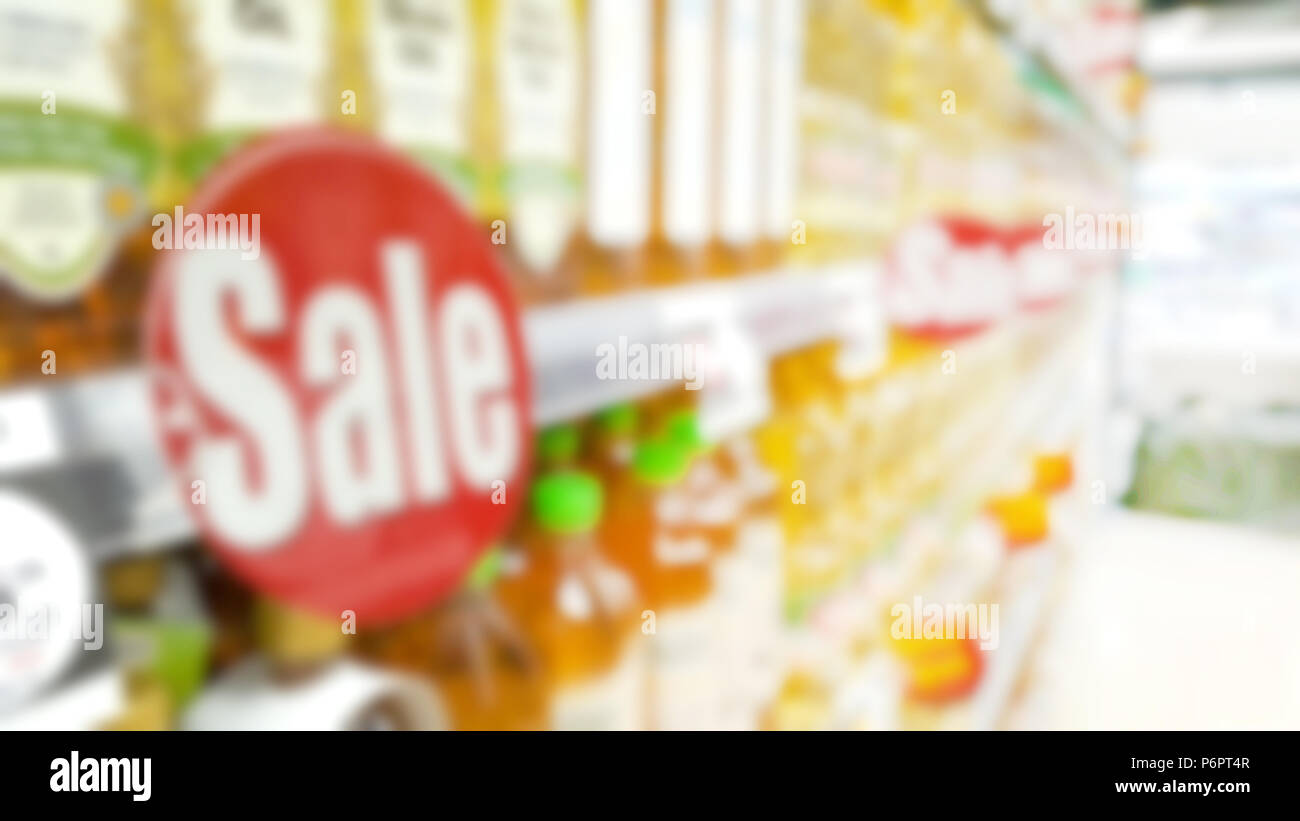 Abstract blur of aisle in supermarket with customers and department ...