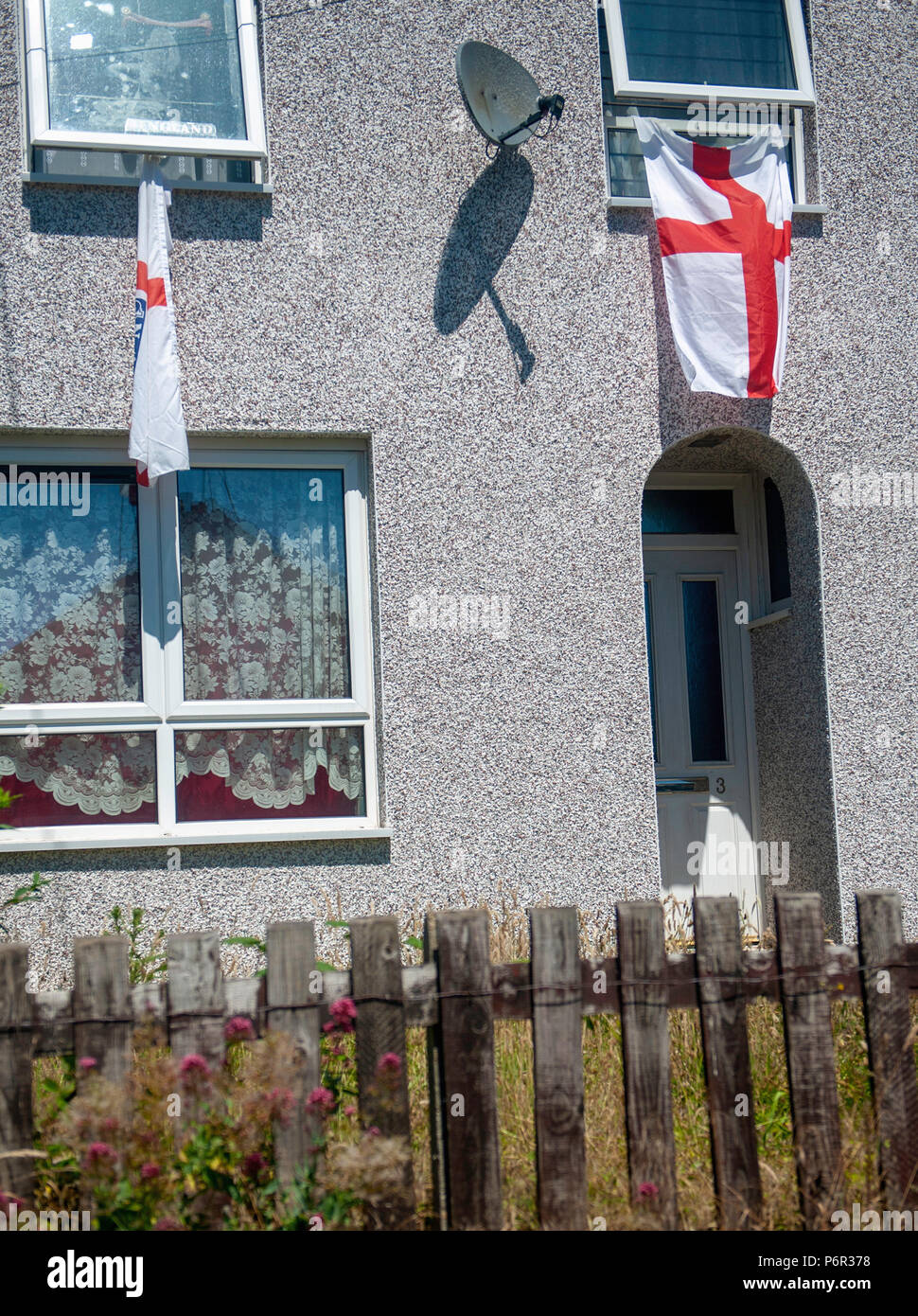 Football flags house windows hi-res stock photography and images - Alamy