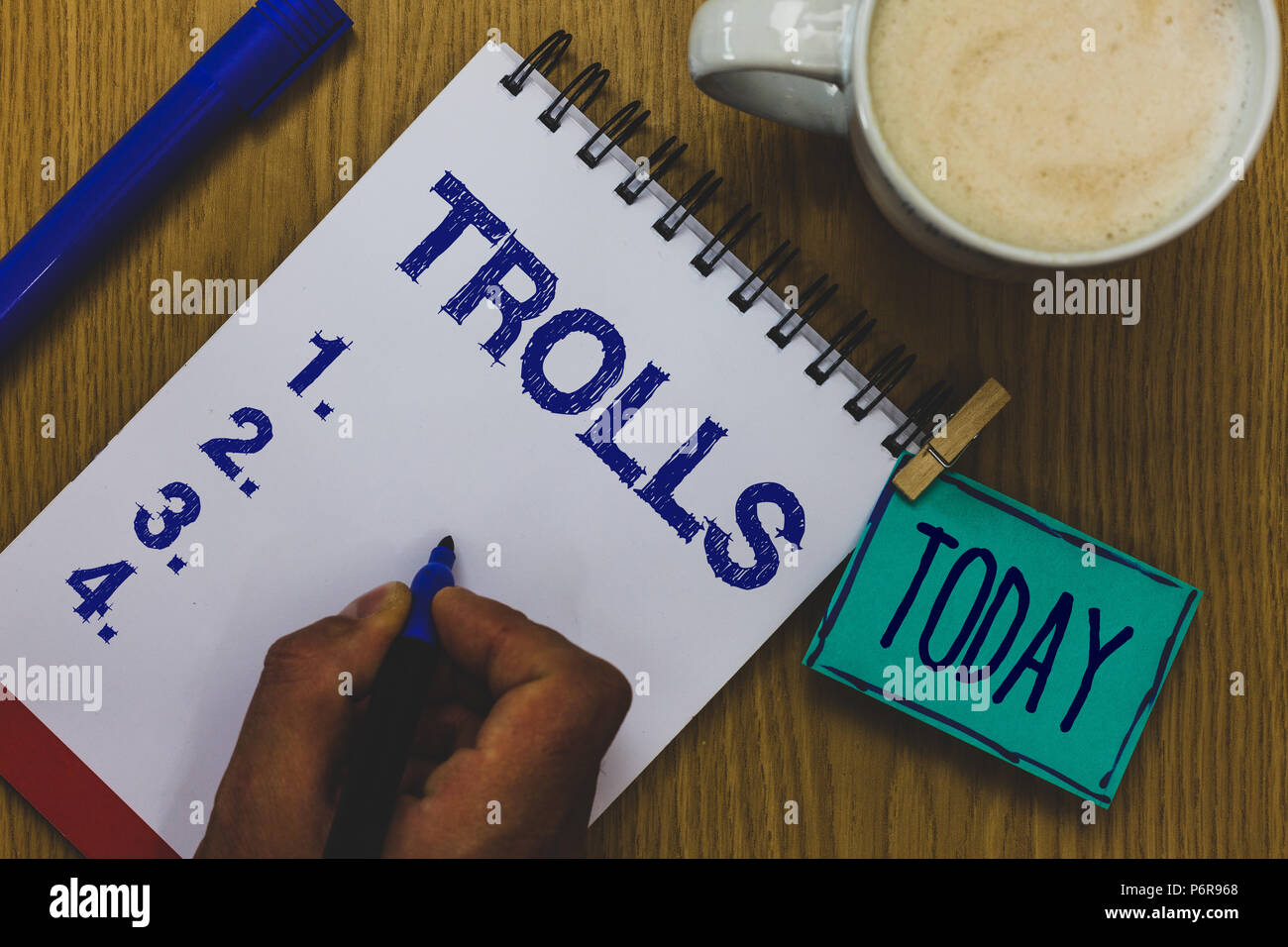 Handwriting text Trolls. Concept meaning Online troublemakers posting ...