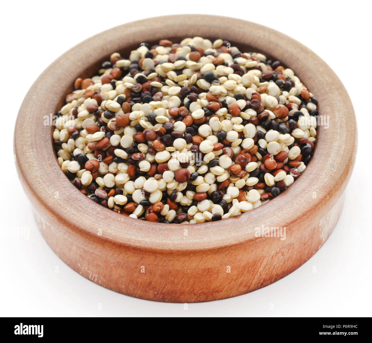 Fresh mixed quinoa in a bowl over white background Stock Photo - Alamy