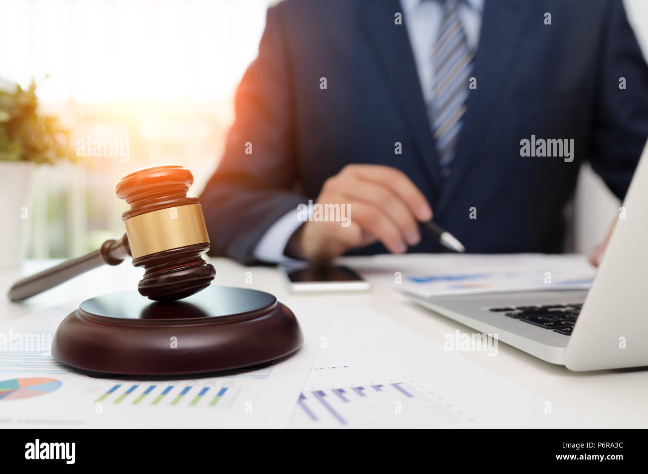 Justice symbol wooden gavel on table. Attorney working in office. Law ...