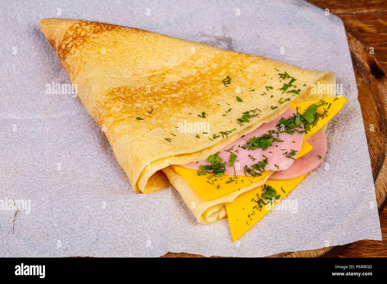 Pancake with ham and cheese Stock Photo - Alamy