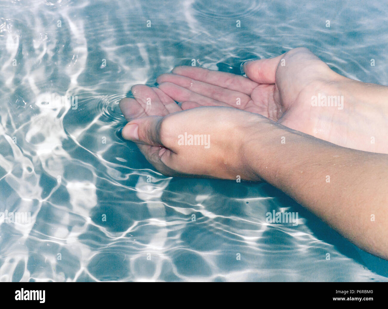 hands in water Stock Photo - Alamy