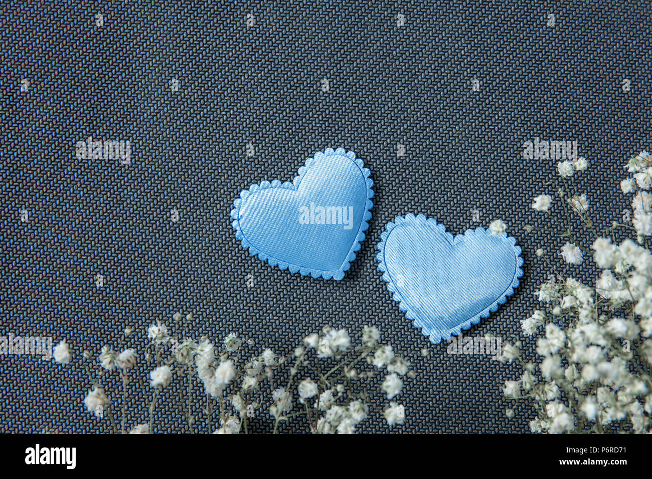 Hearts and beautiful flowers on grey background Stock Photo - Alamy