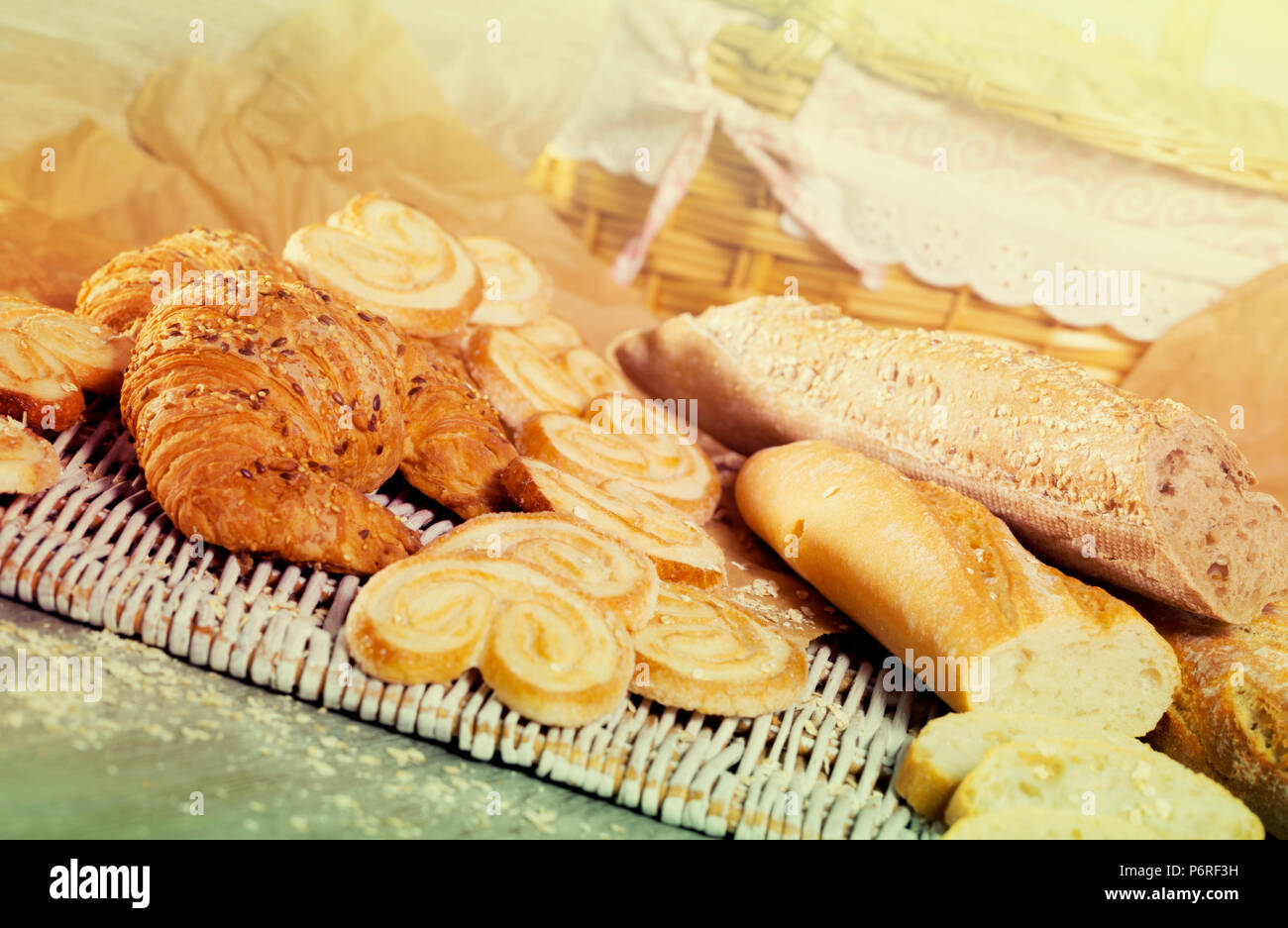 Image of various kinds of bread and bakery products on table Stock ...
