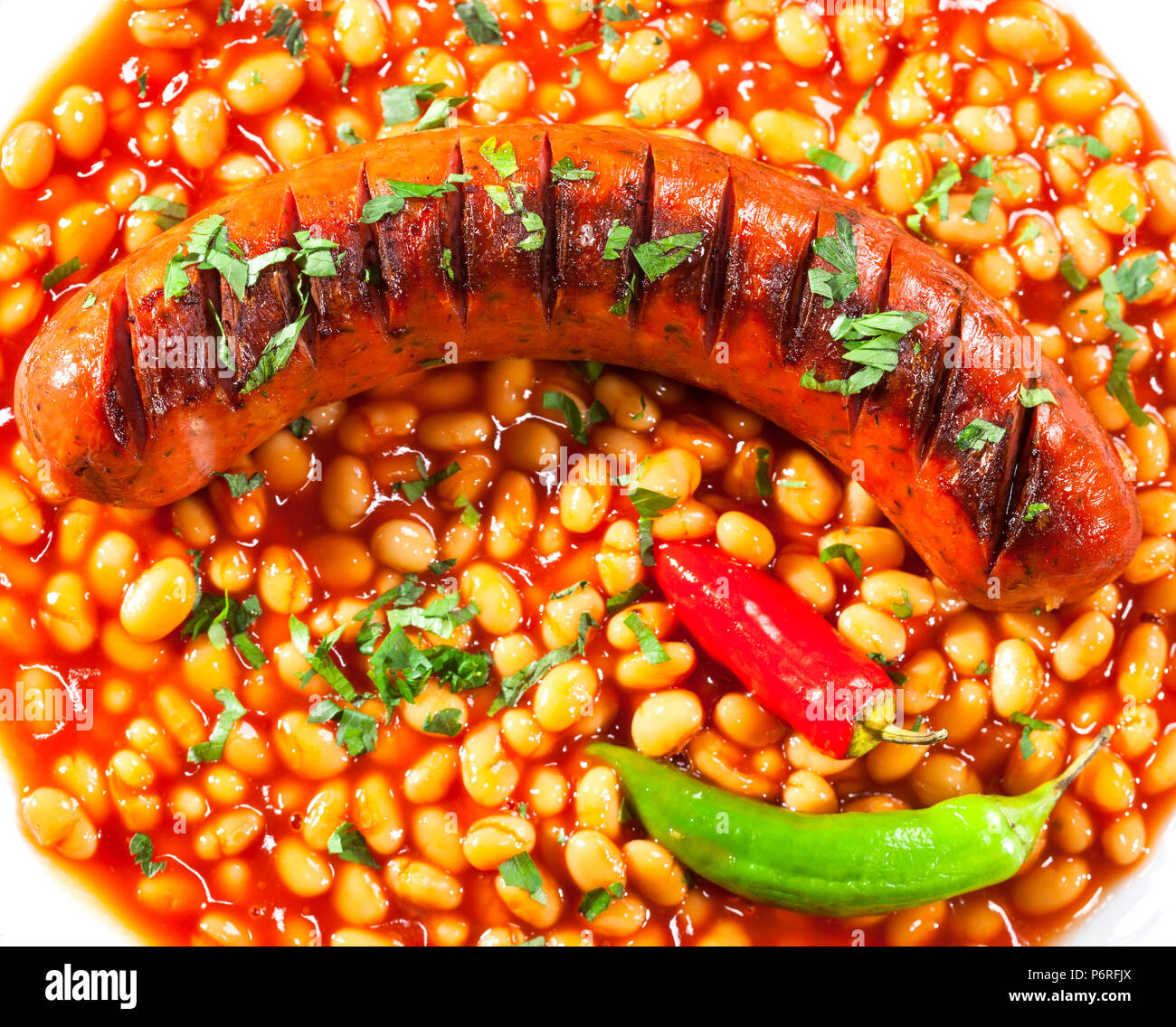 Beans with grilled sausage, traditional european homemade meal Stock ...