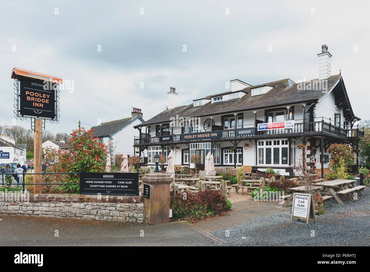 Building of Pooley Bridge Inn, a local family run accommodation located ...
