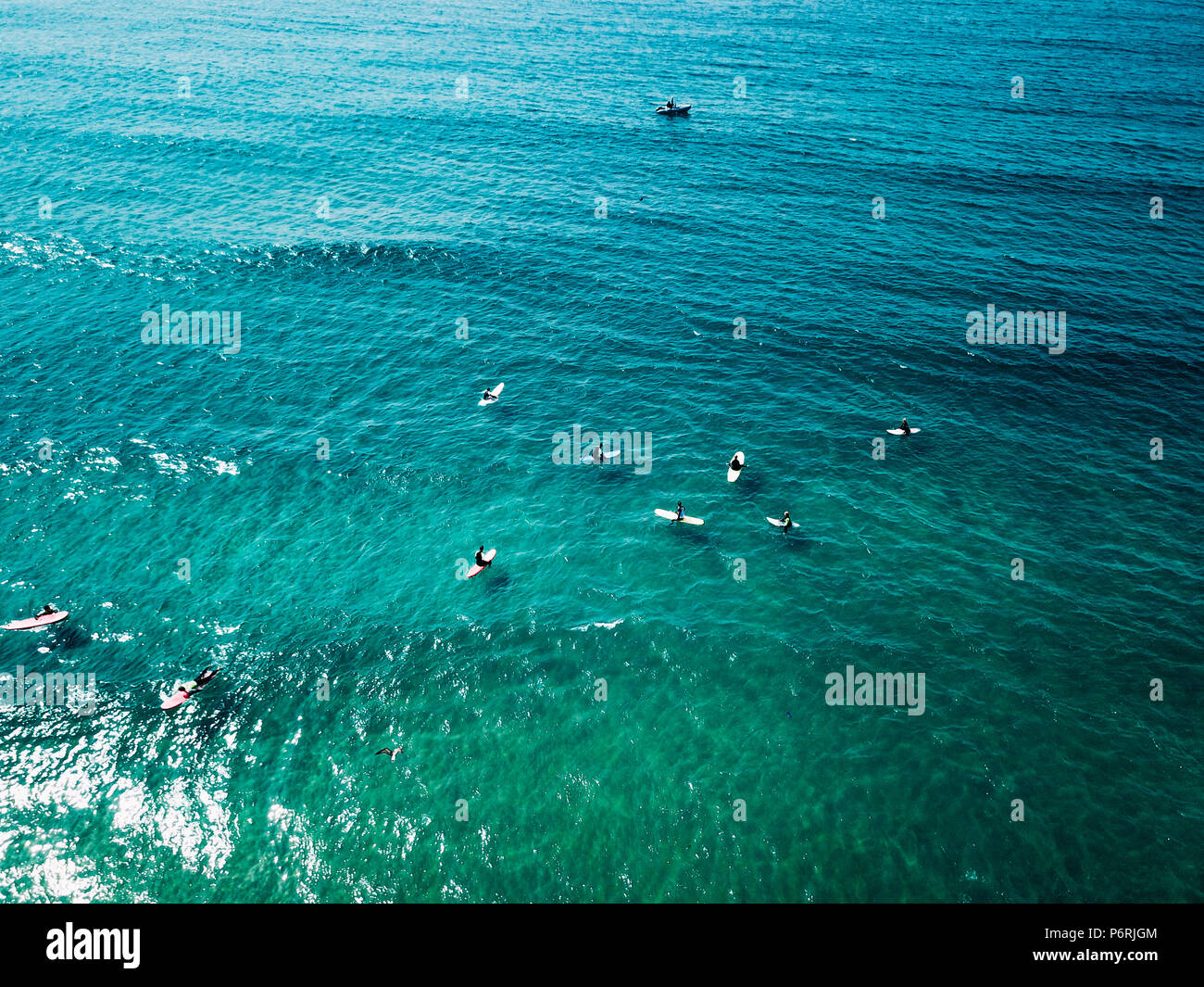 Surfers in water beach next hi-res stock photography and images - Alamy