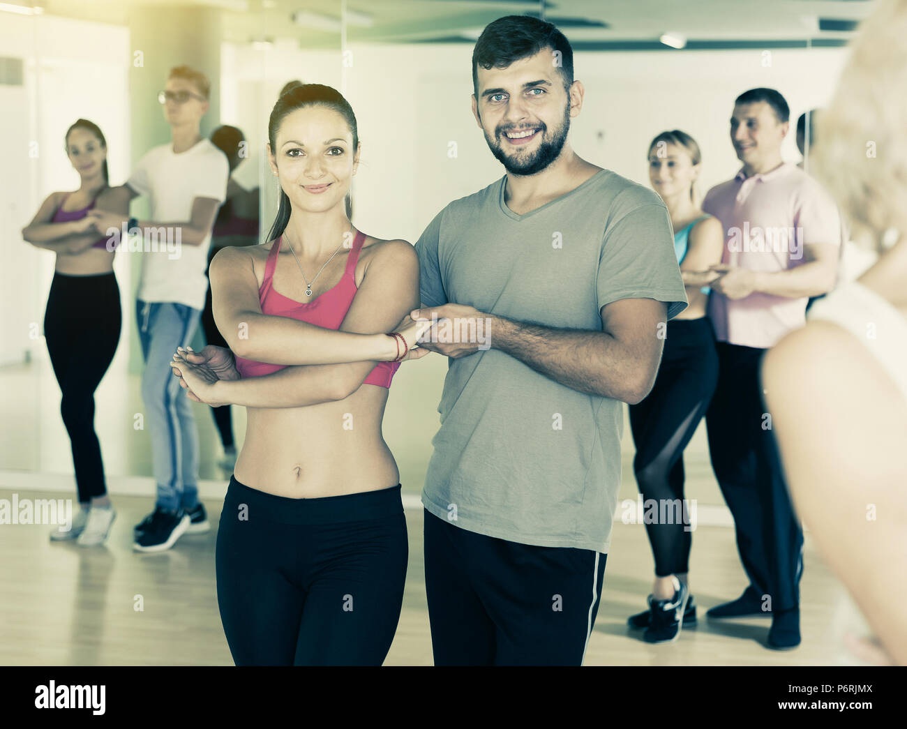 Sports dancing pair dance tango together in studio Stock Photo - Alamy