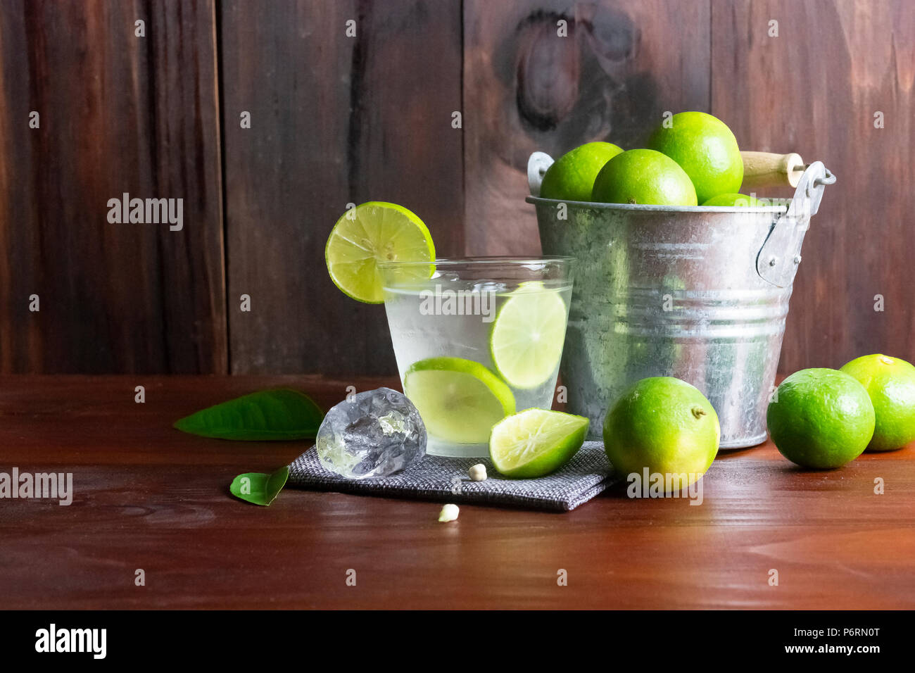 Lime juice or lime lemonade or green lemon with lemon tank on wooden ...