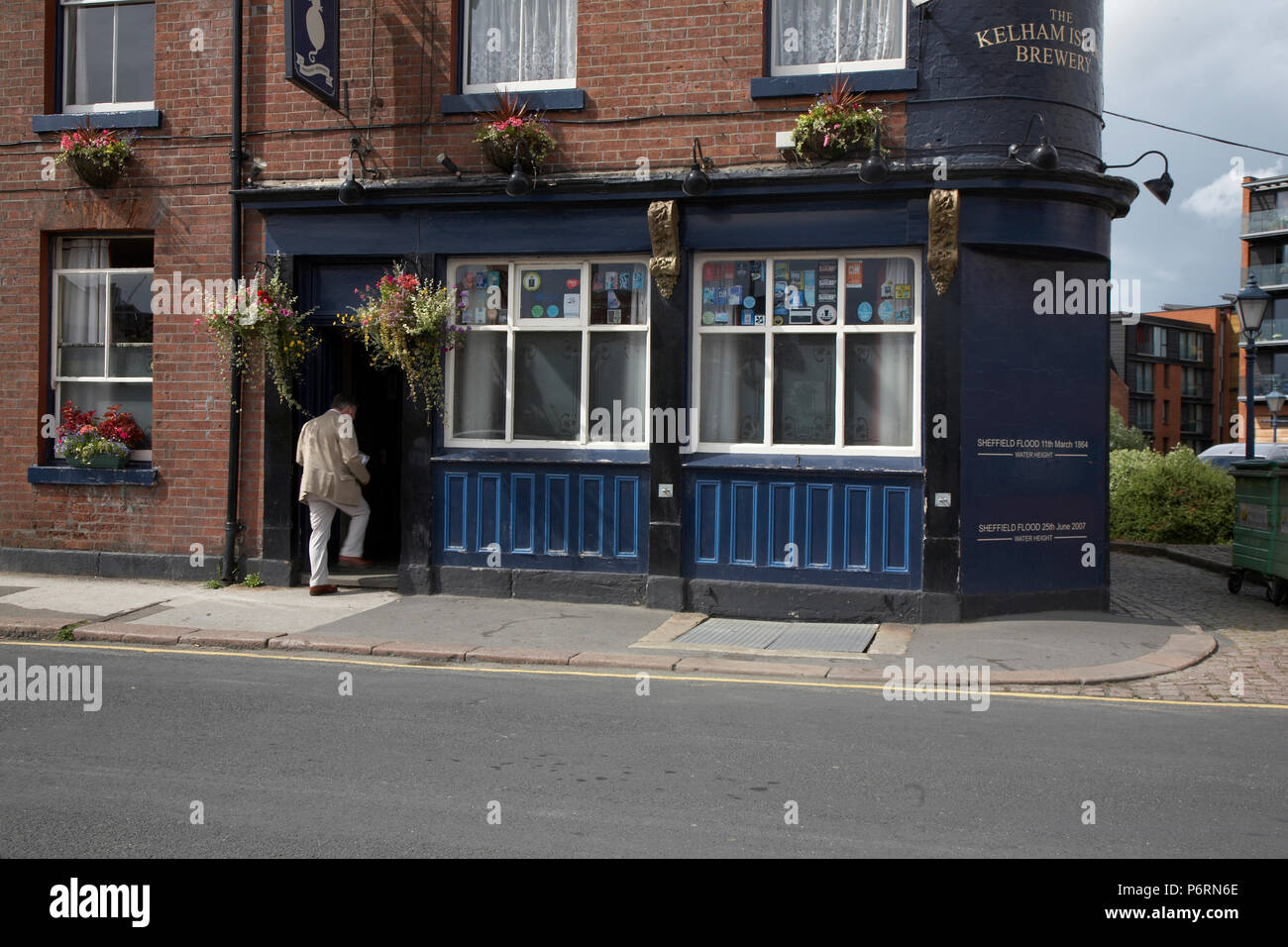 man walking into the Fat Cat Real Ale pub in Sheffield Stock Photo - Alamy