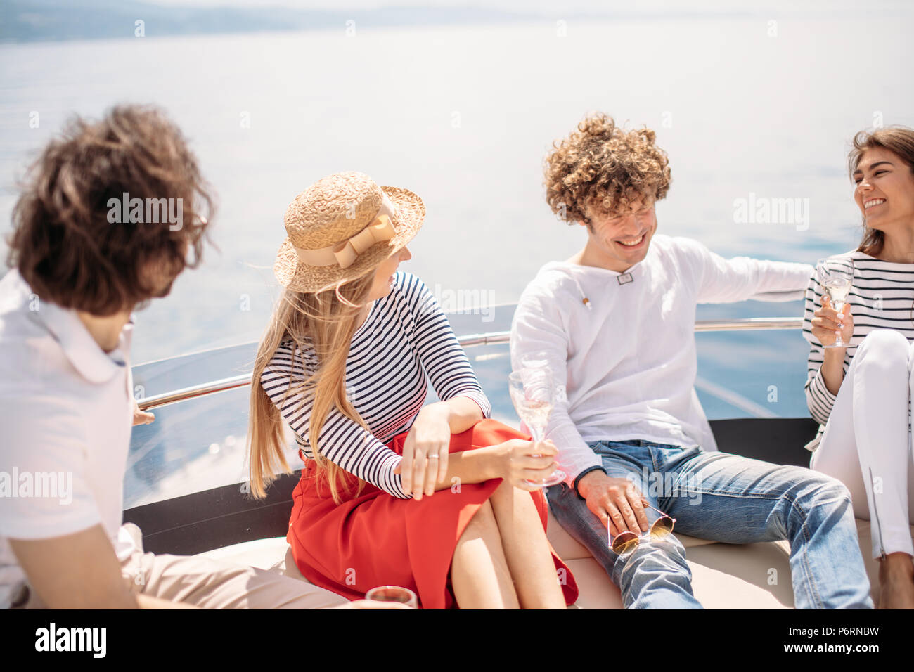 Happy young friends chilling in pleasure yacht - Relaxing people ...